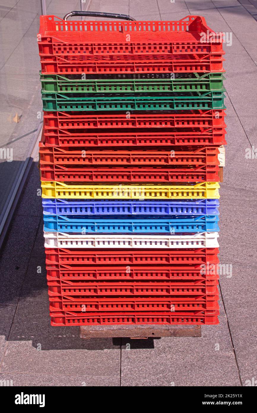 Colourful plastic crates stack Stock Photo - Alamy