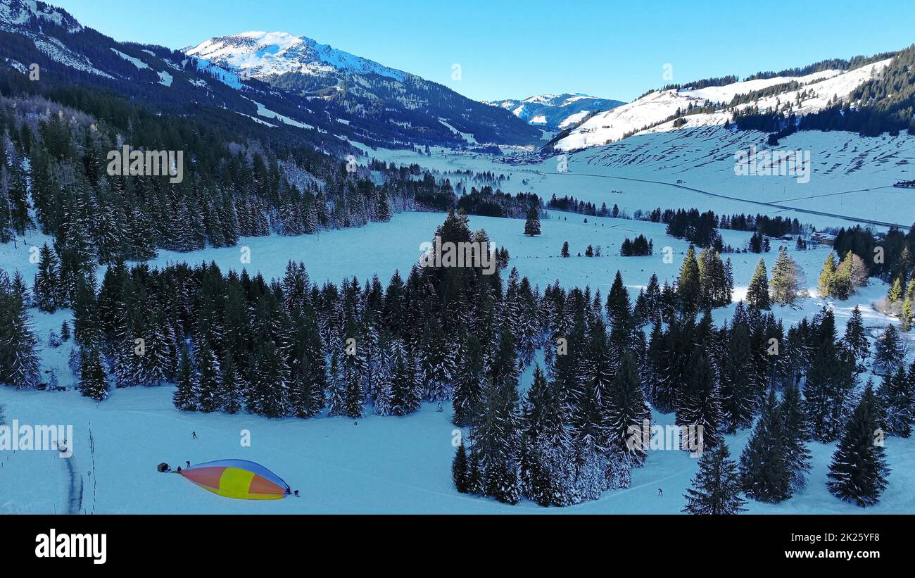 Aerial photo with drone of mountain landscape and balloon in Tannheimer ...