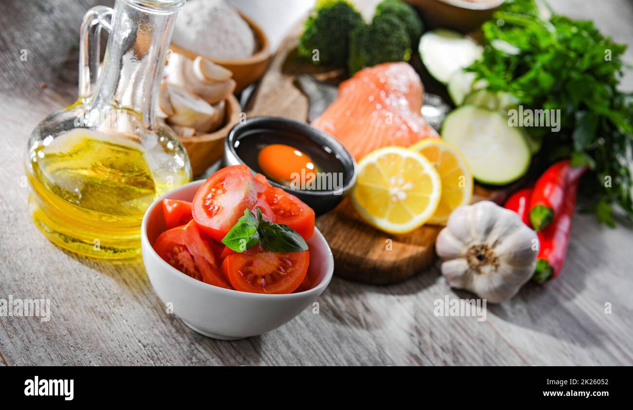 Fresh food ingredients prepared for cooking on a kitchen table Stock ...