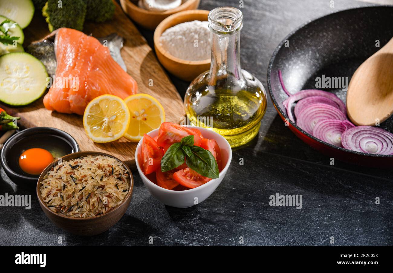 Fresh food ingredients prepared for cooking on a kitchen table Stock ...