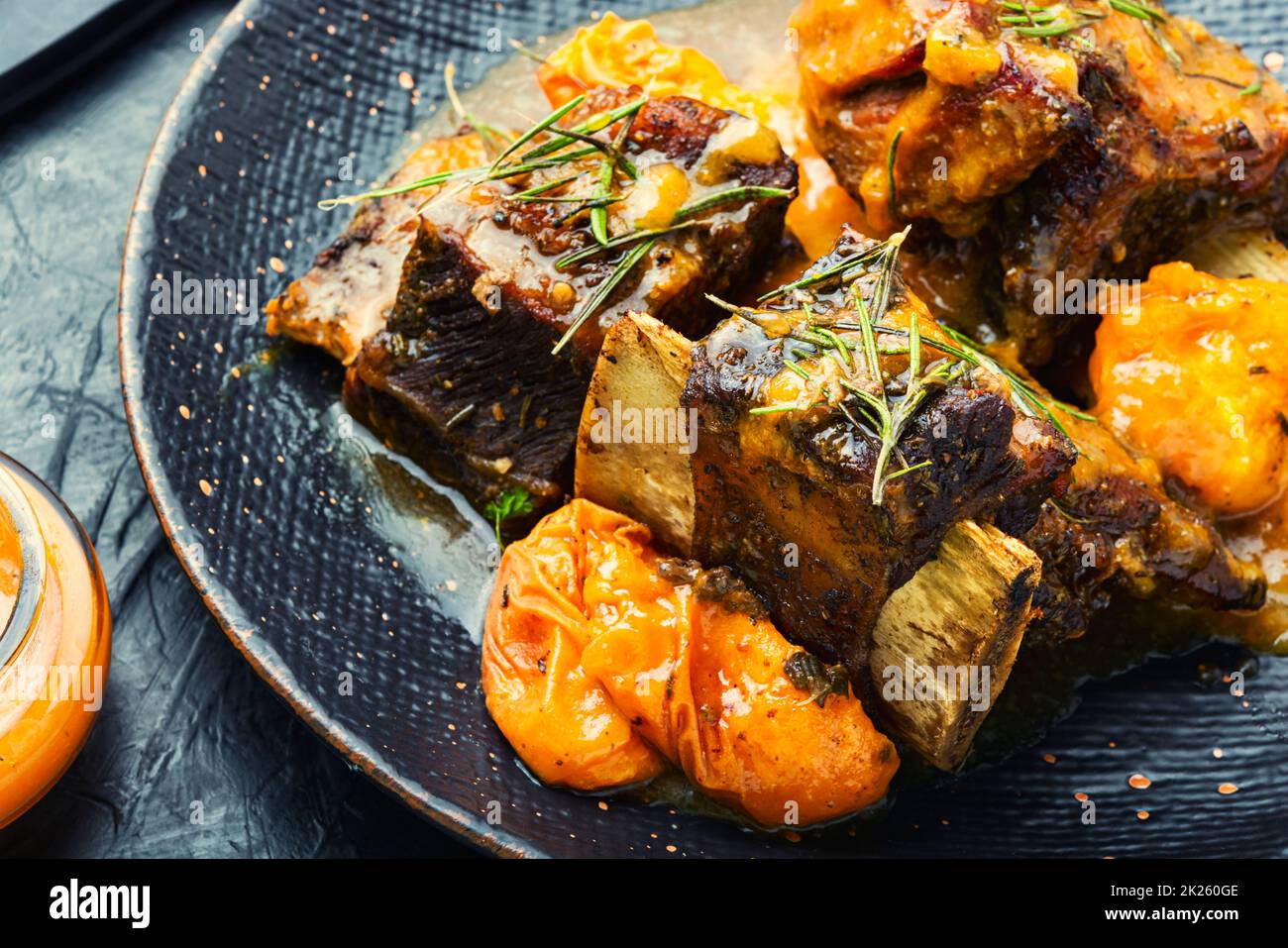 Fried beef ribs in fruit sauce Stock Photo - Alamy