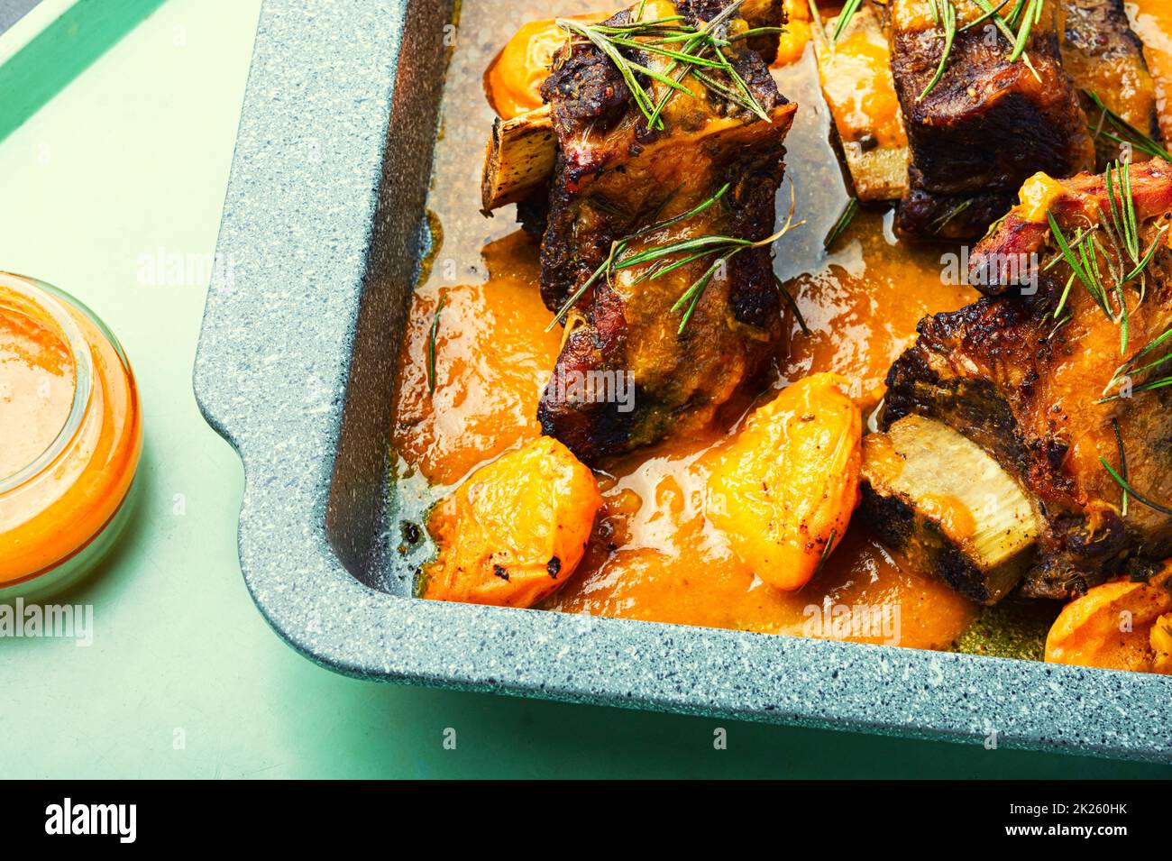Fried beef ribs in fruit sauce Stock Photo - Alamy