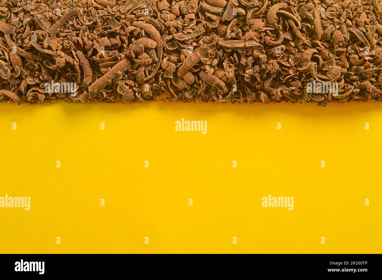 Grated chocolate texture. Ground chocolate background. Scattered grated ...