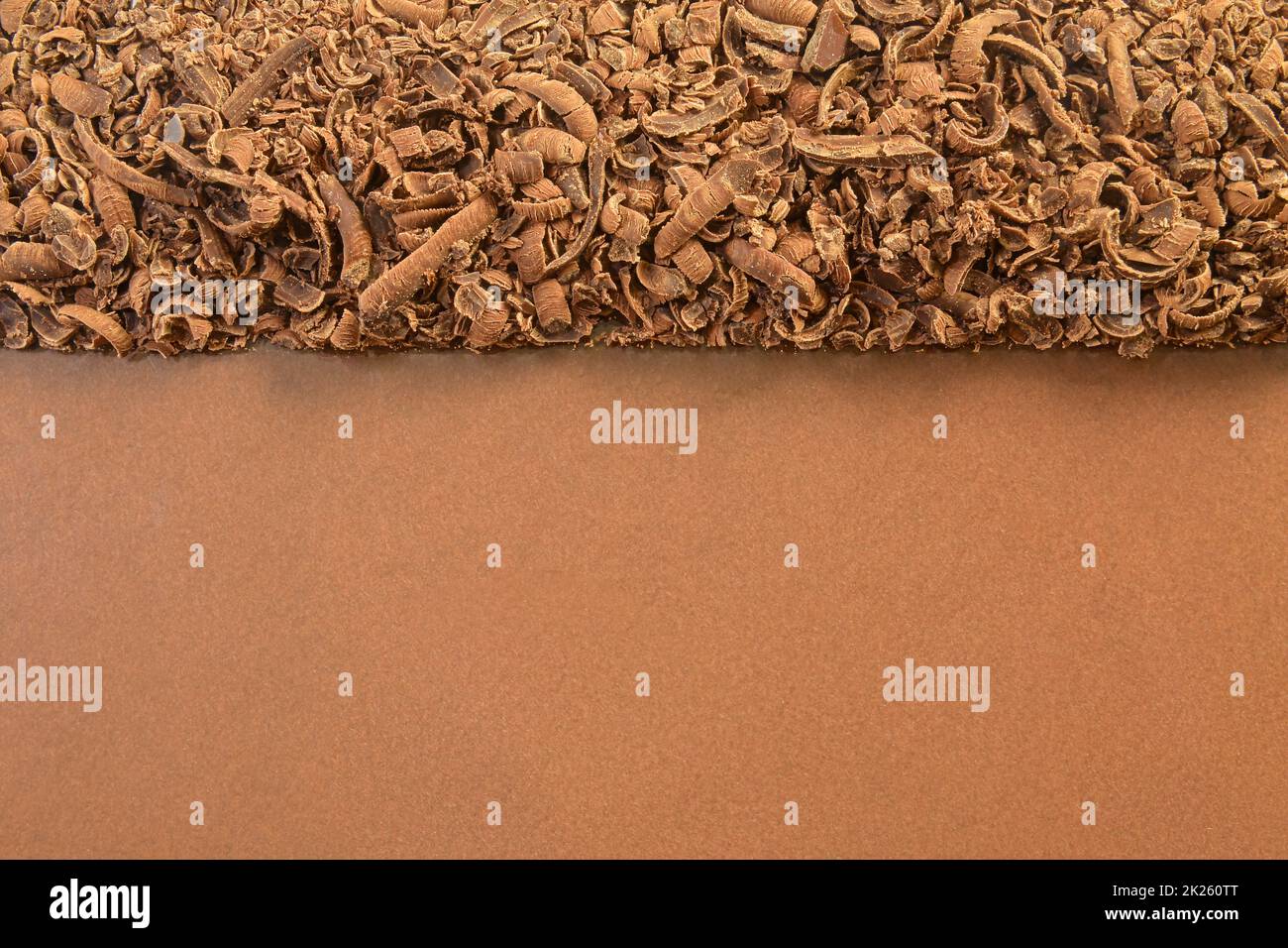 Grated chocolate texture. Ground chocolate background. Scattered grated ...