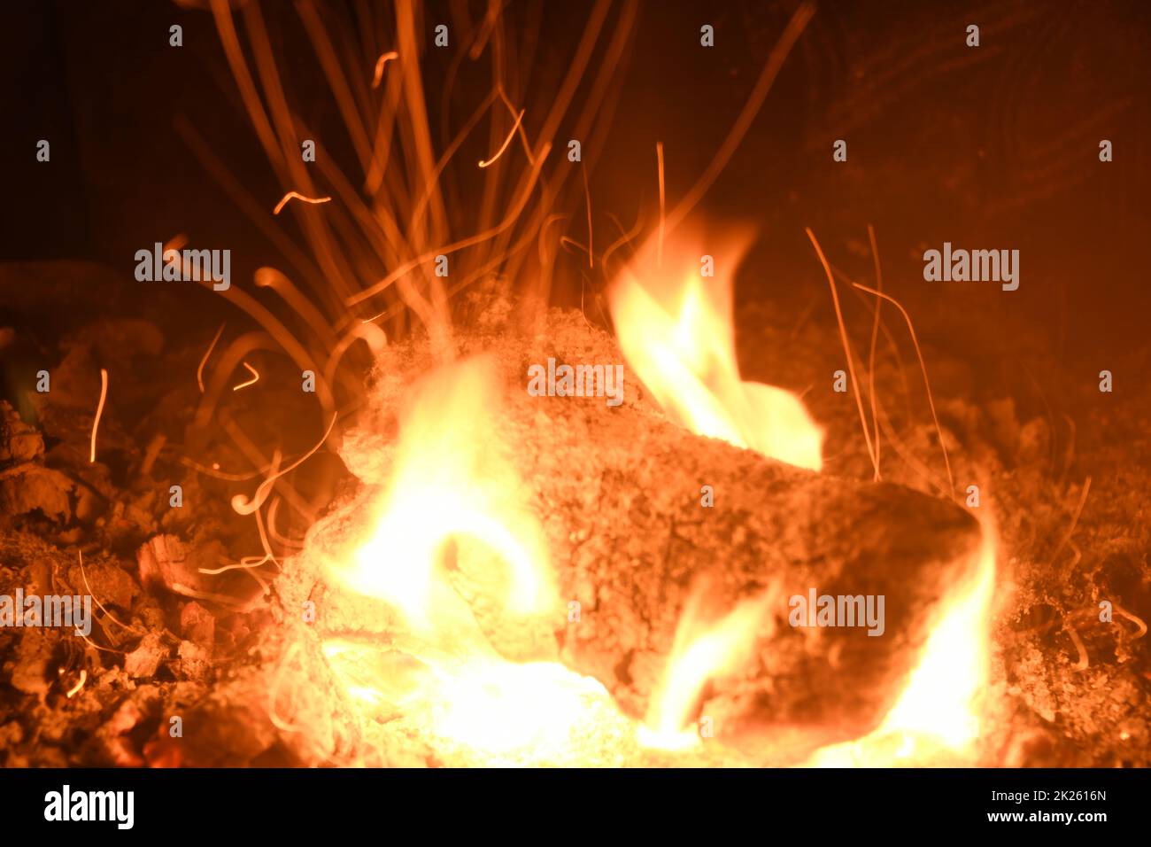 Cozy and warming log fire in the fireplace, in the province of Alicante ...