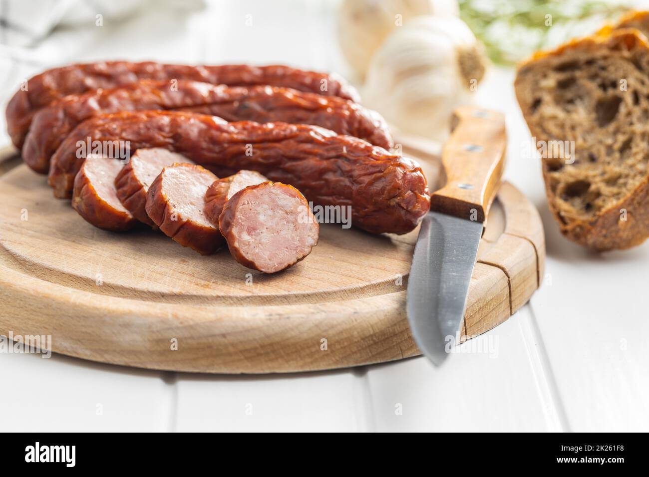 Smoked pork sausages. Sliced salami Stock Photo - Alamy