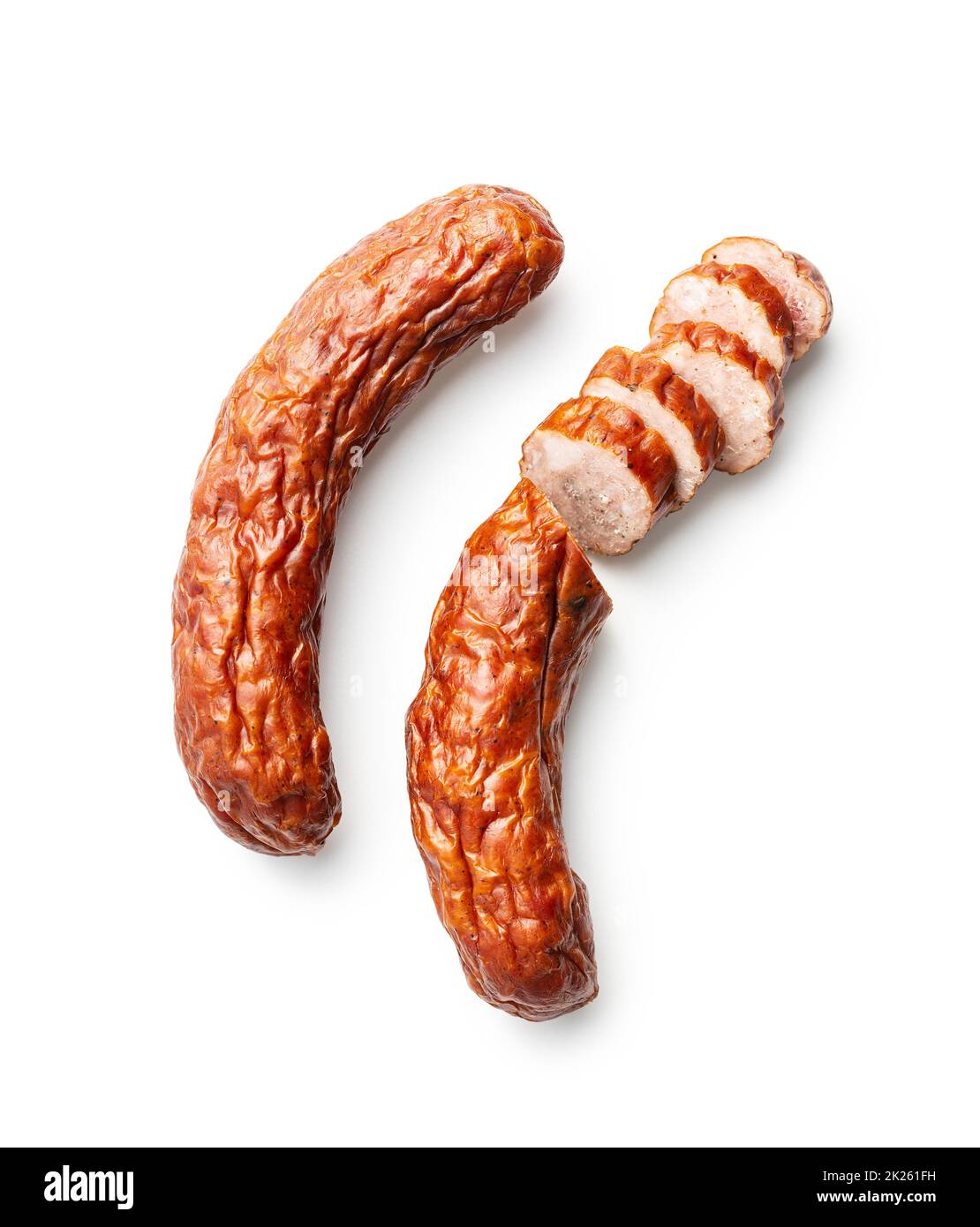 Smoked pork sausages. Sliced salami Stock Photo - Alamy