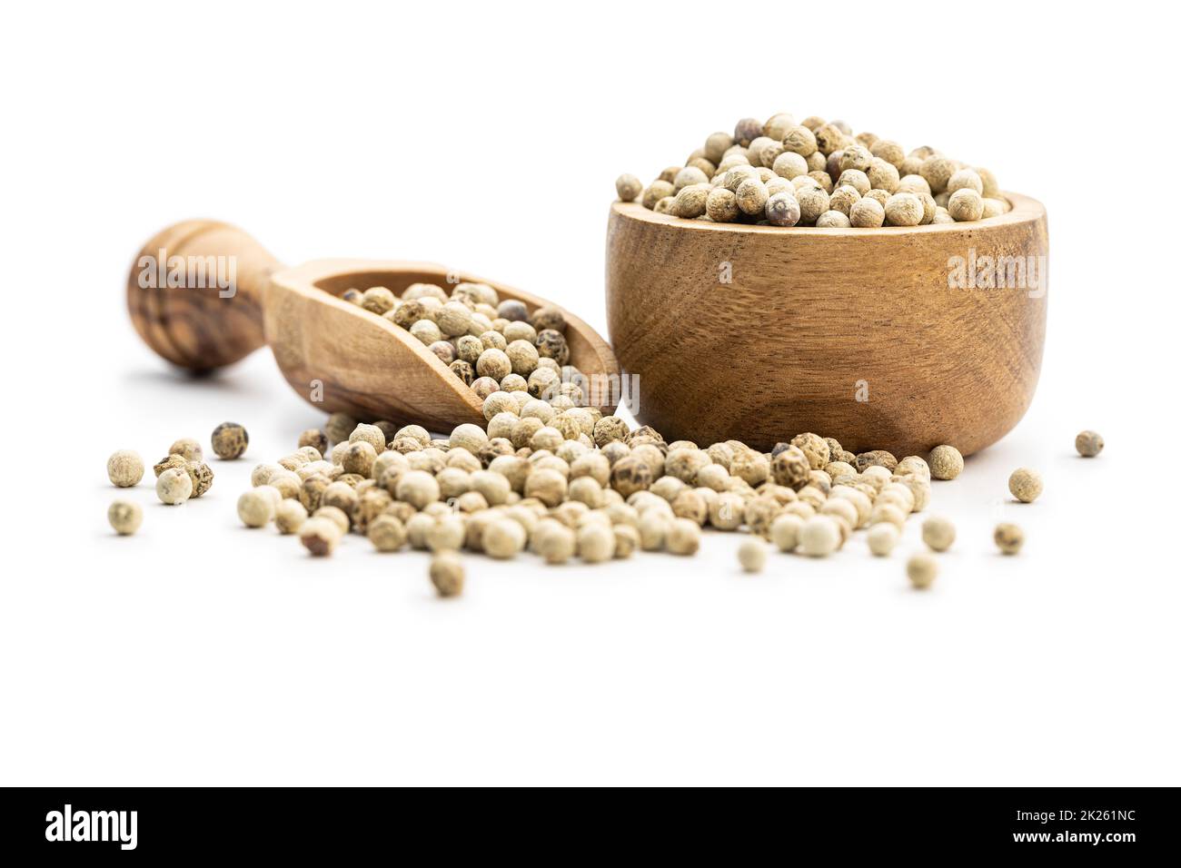 Whole pepper spice. White peppercorn grain in wooden bowl Stock Photo ...