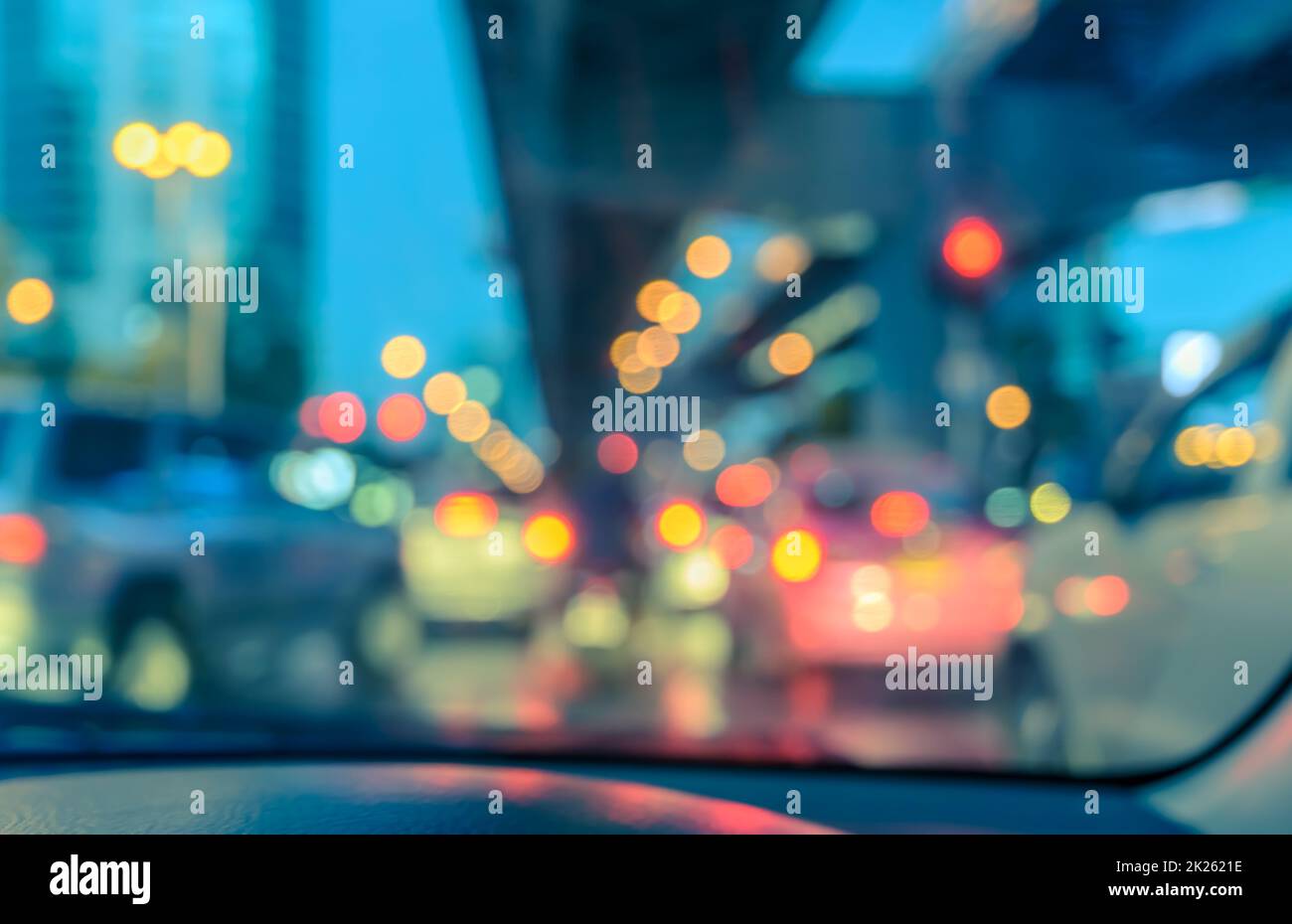 Blur car seen through windscreen with bokeh lights at twilight Stock ...