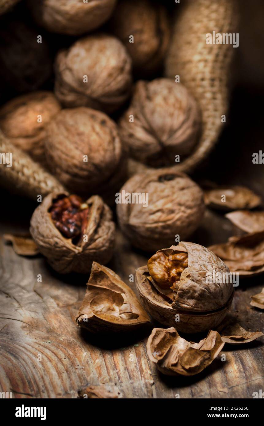 Walnuts old wooden plank hi-res stock photography and images - Alamy
