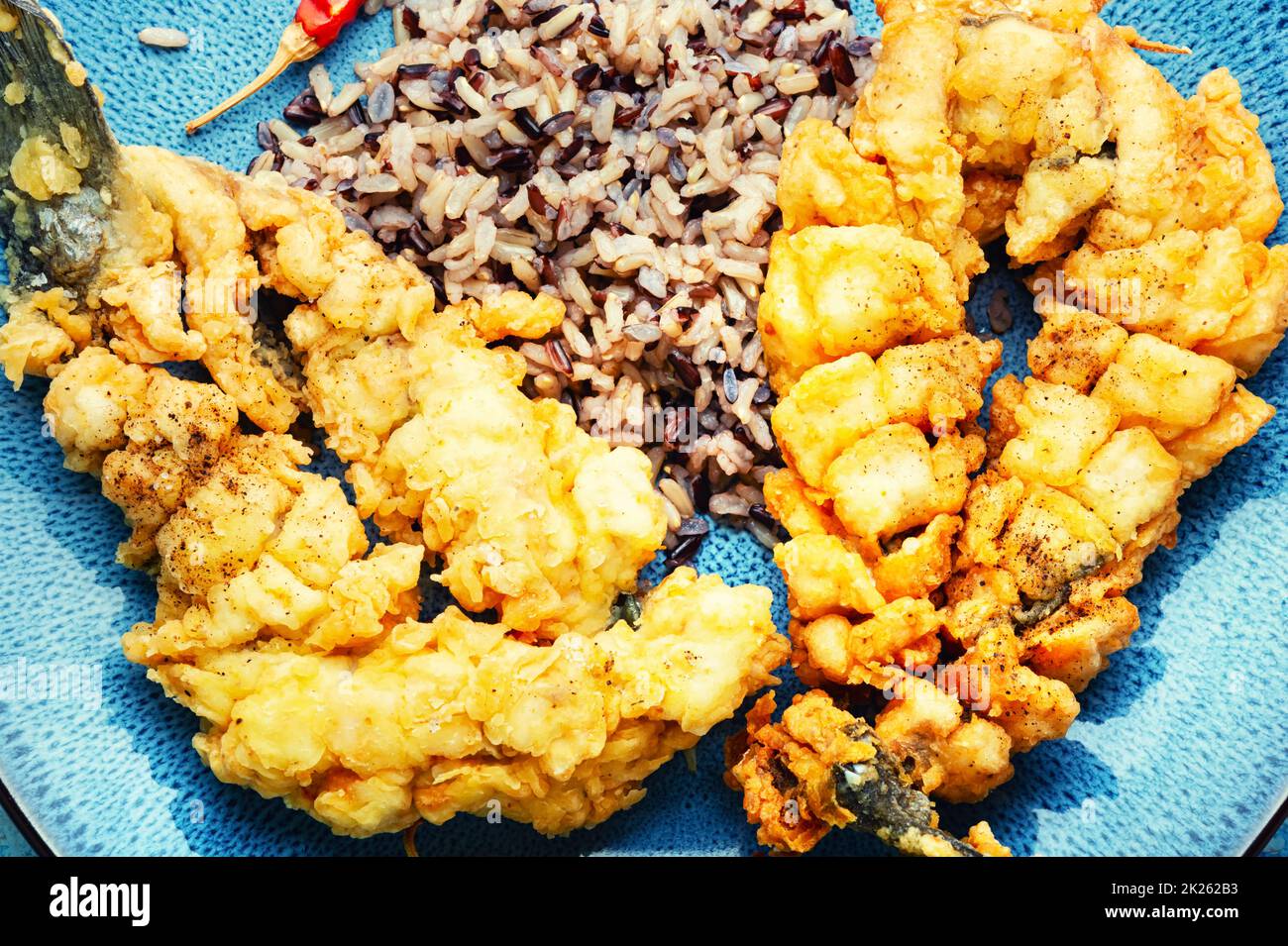 Appetizing fried sea bass fish, seafood Stock Photo - Alamy