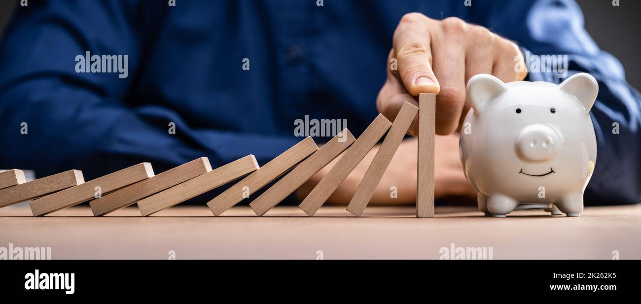 Stop Domino Chain Fall Stock Photo - Alamy