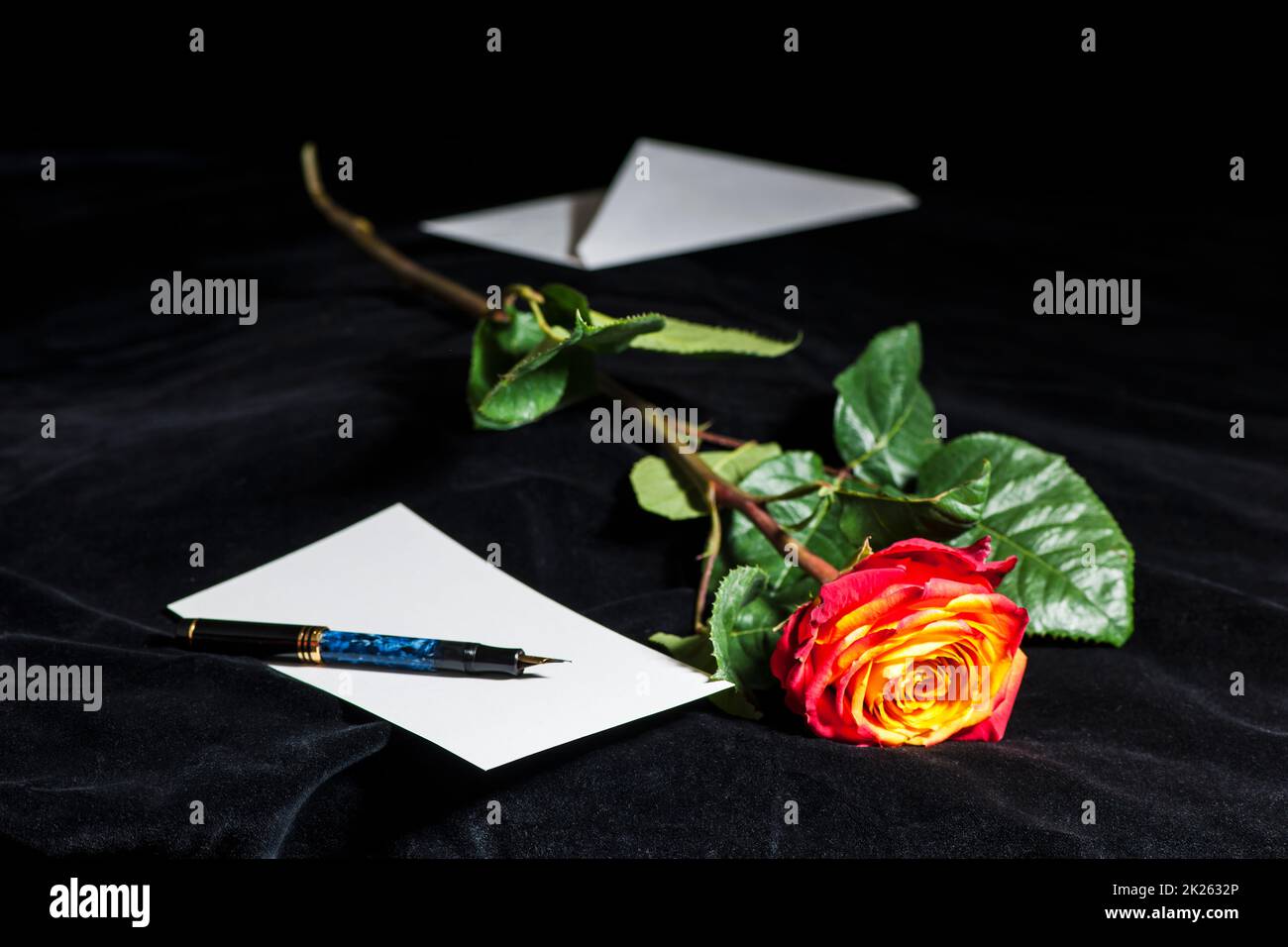 Red rose flower envelope hi-res stock photography and images - Alamy