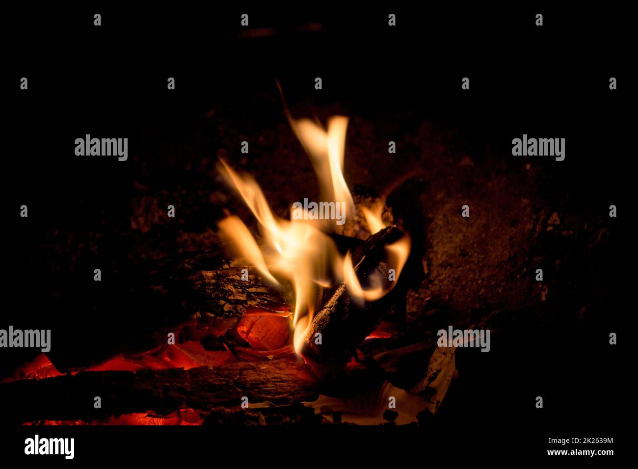 Fire flames and red-hot wooden logs (2 Stock Photo - Alamy