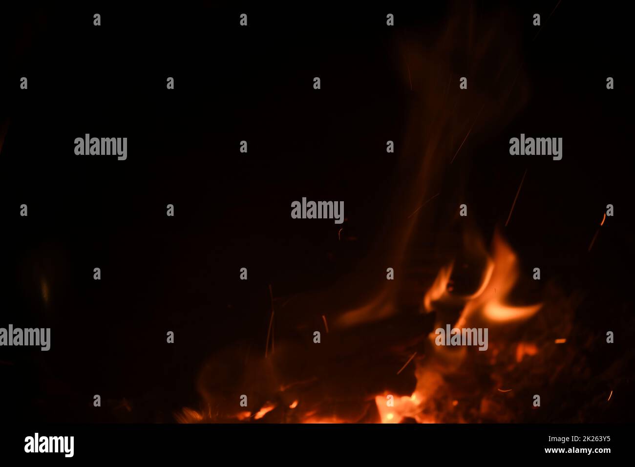 Cozy and warming log fire in the fireplace, in the province of Alicante ...