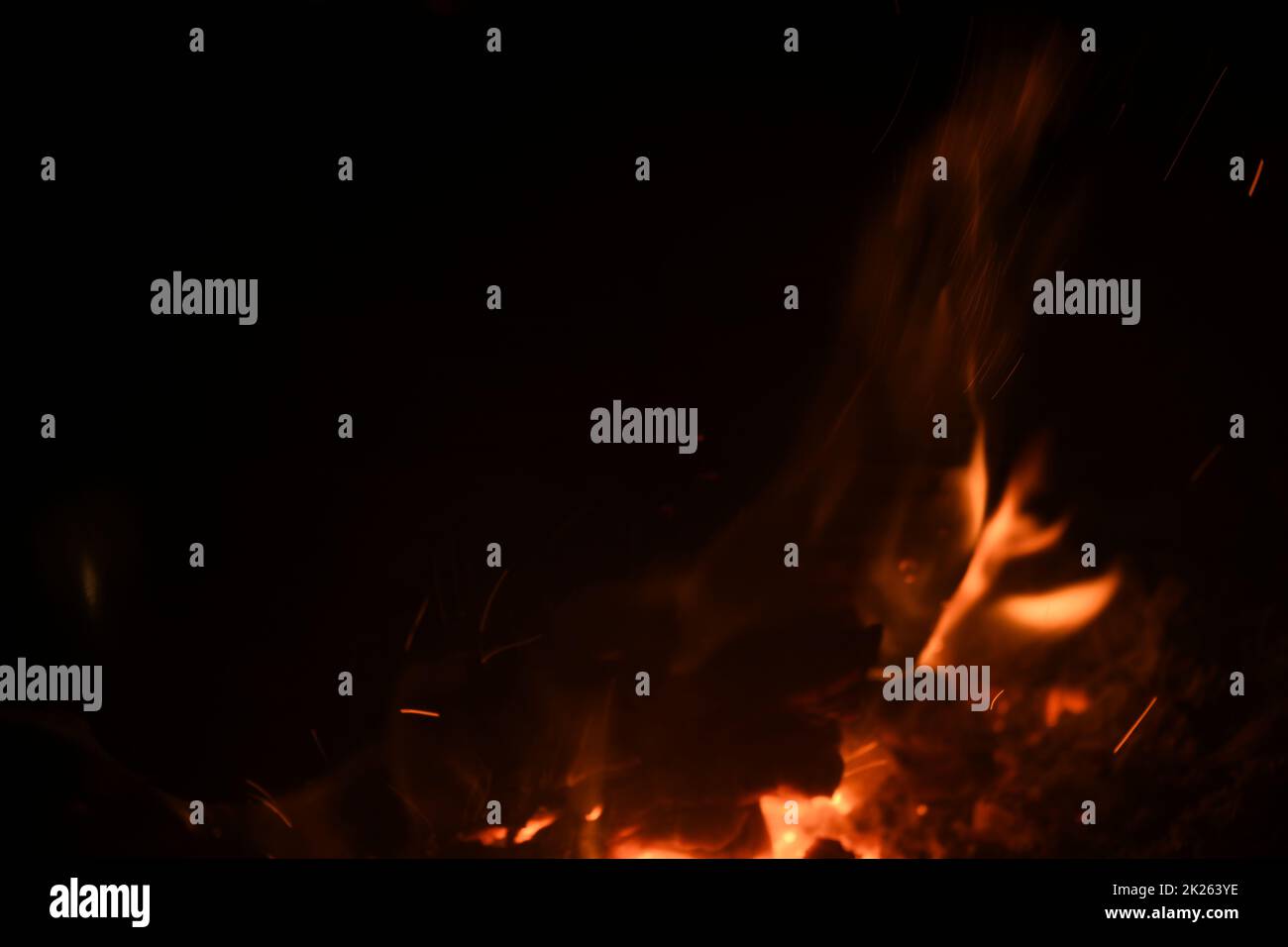 Cozy and warming log fire in the fireplace, in the province of Alicante ...