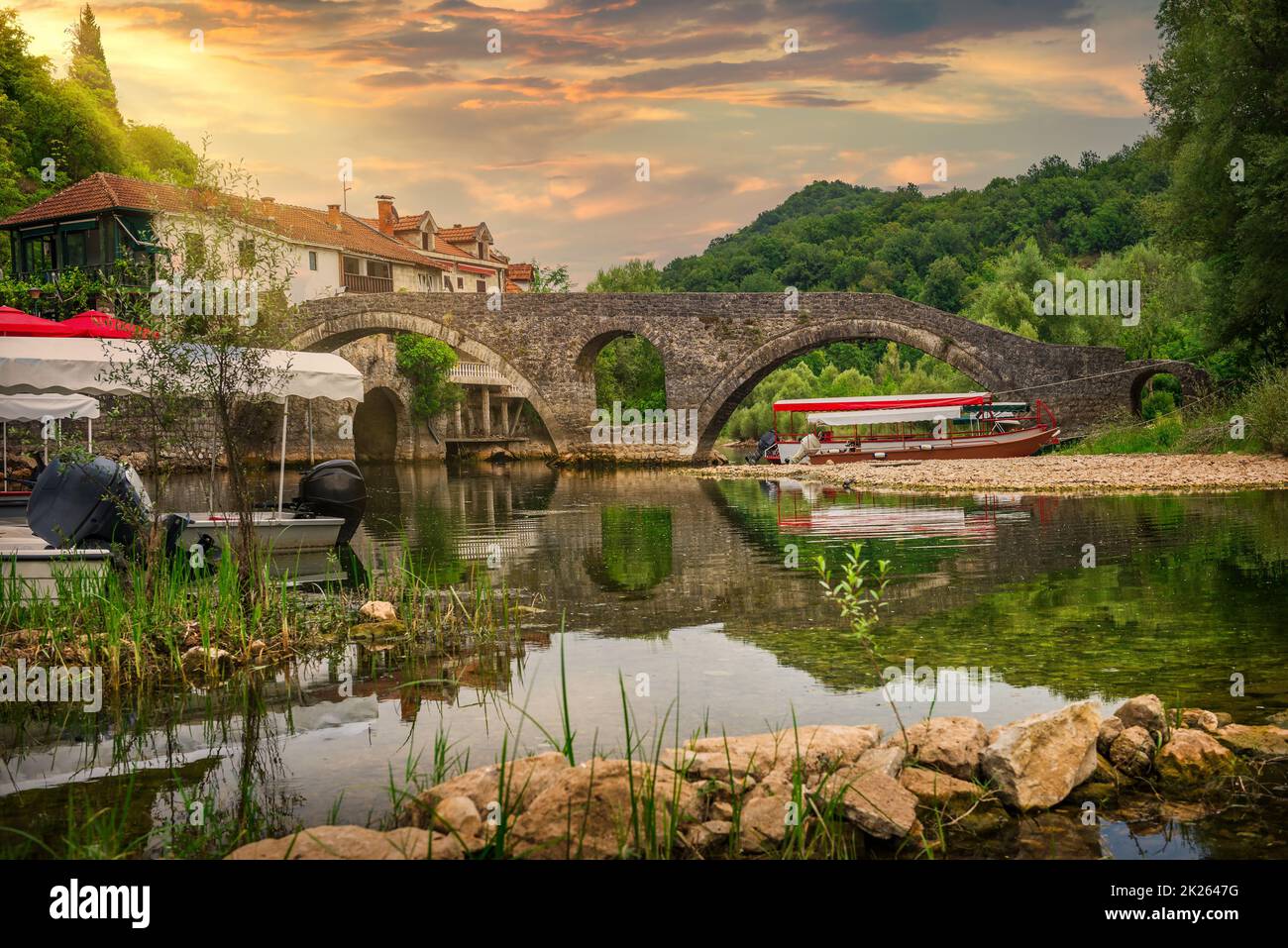 Arched bridge at sunset Stock Photo - Alamy