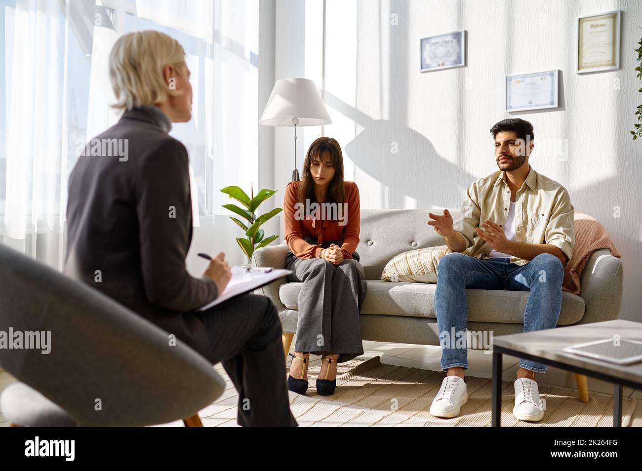 Young family couple at psychologist counseling meeting Stock Photo - Alamy