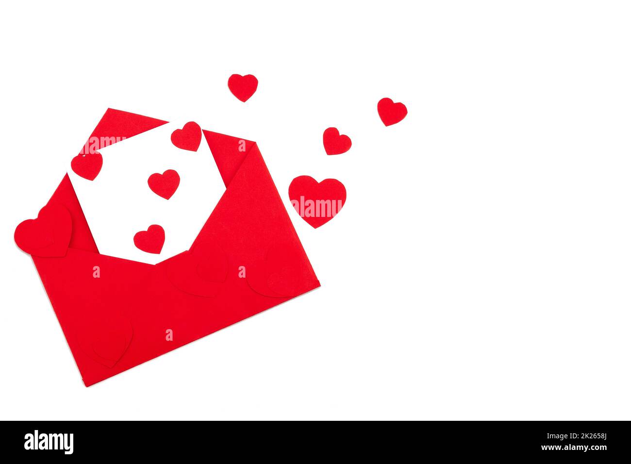 Red envelope with a white sheet of paper and red hearts on a white ...