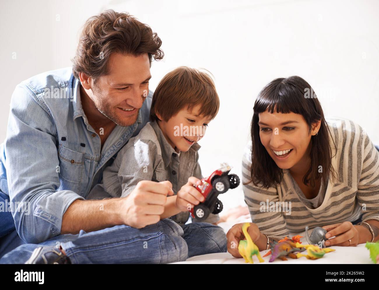 Never mind the mess, were making memories. happy parents playing with ...