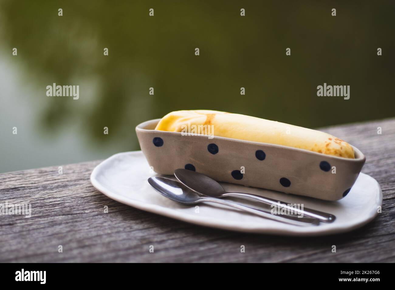 Banana crepe sweet dessert object still life. The crepe put in the ...