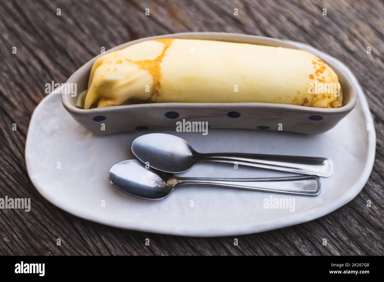 Banana crepe sweet dessert object still life. The crepe put in the ...