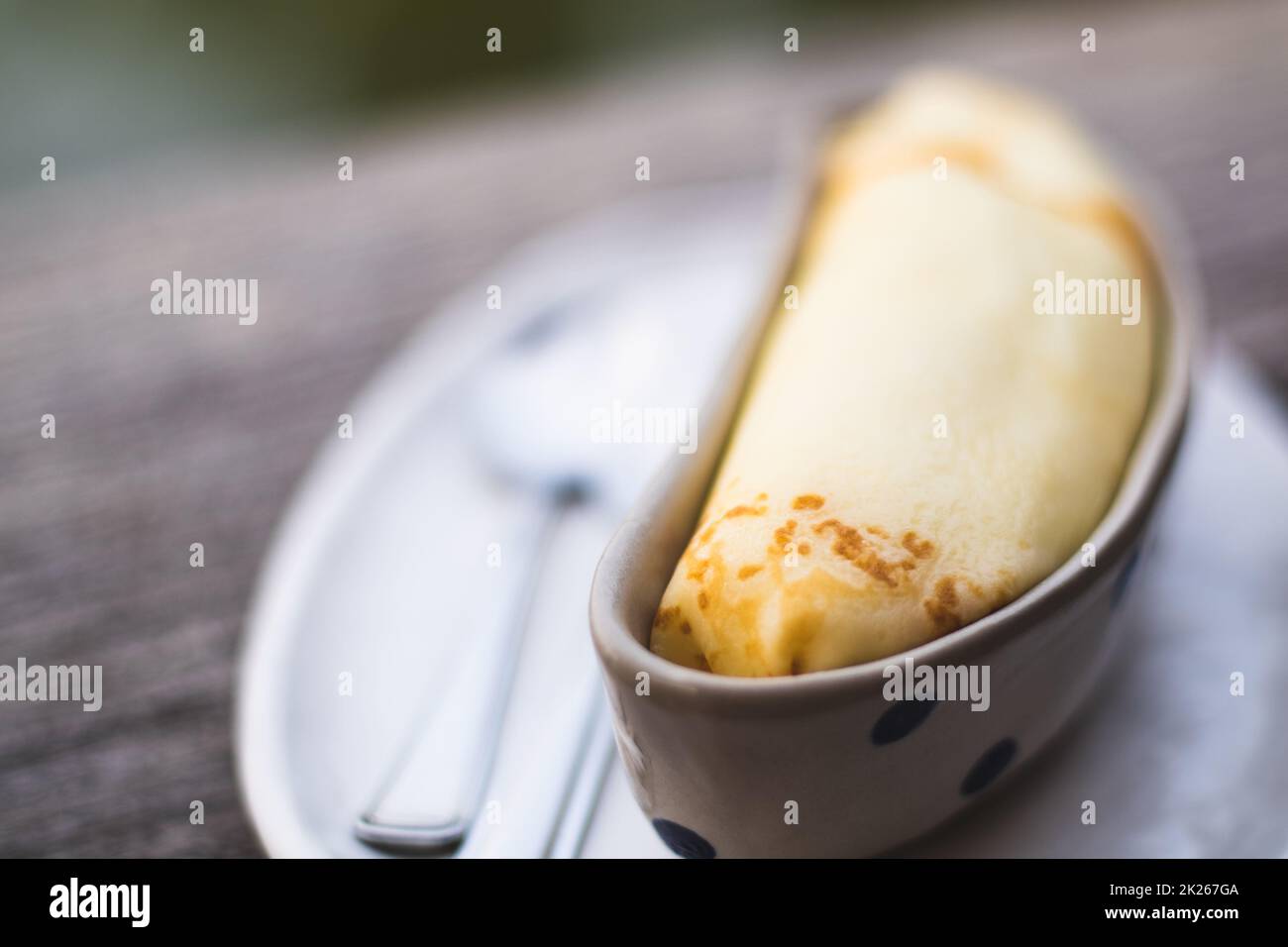 Banana crepe sweet dessert object still life. The crepe put in the ...