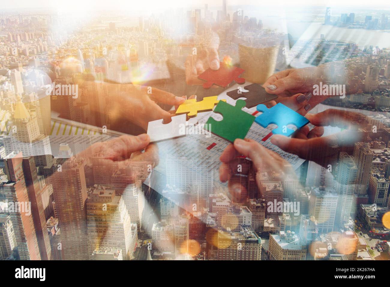 Teamwork of partners connect puzzle pieces as integration and startup ...