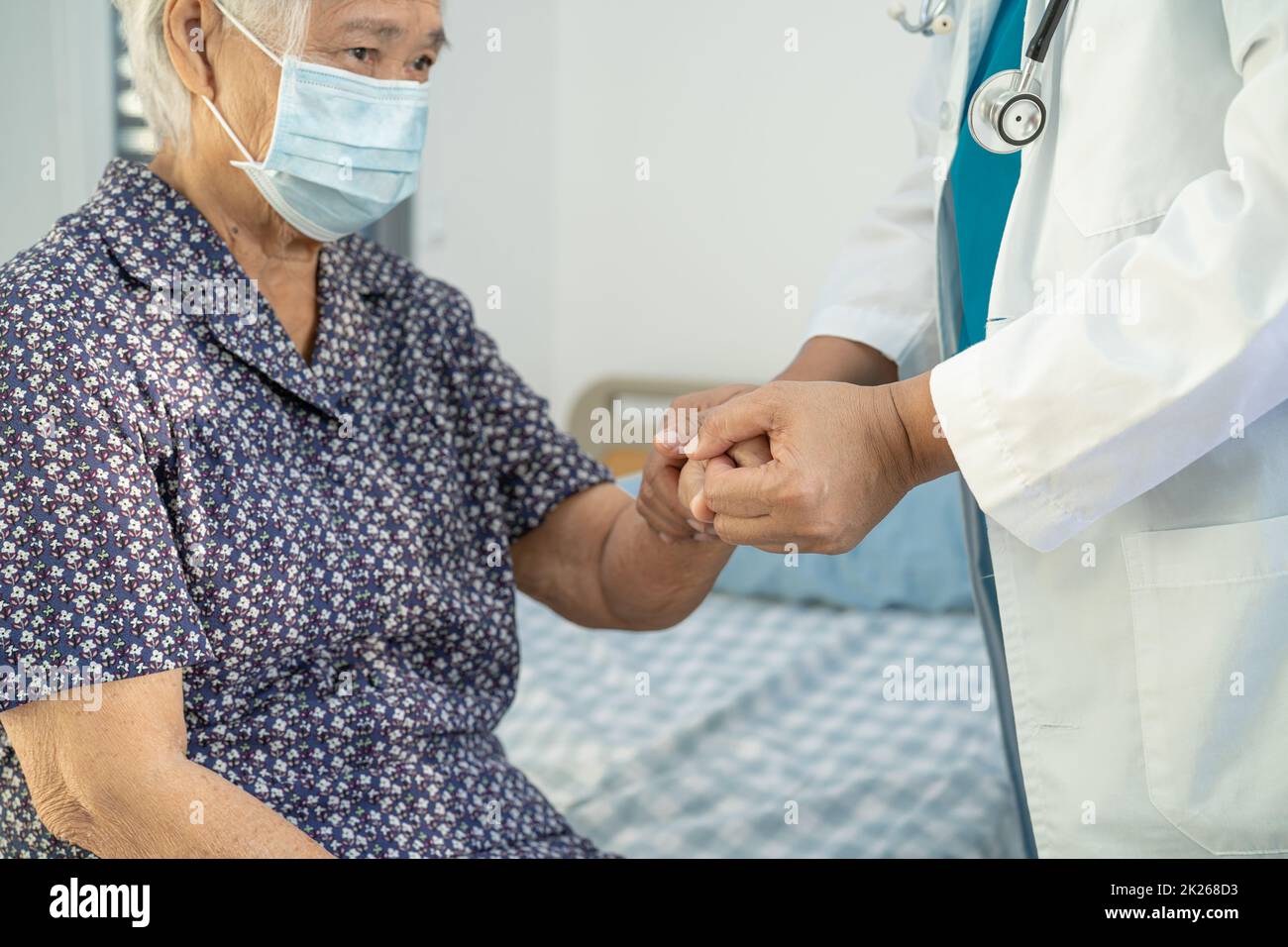 Holding hands Asian senior or elderly old lady woman patient with love, care, encourage and ...