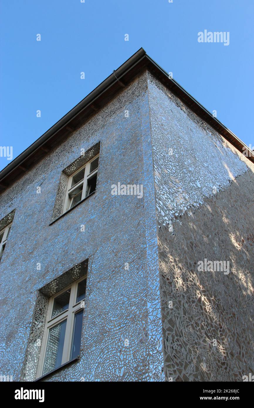 Building with mirrored walls. Facade of building made of mirror ...