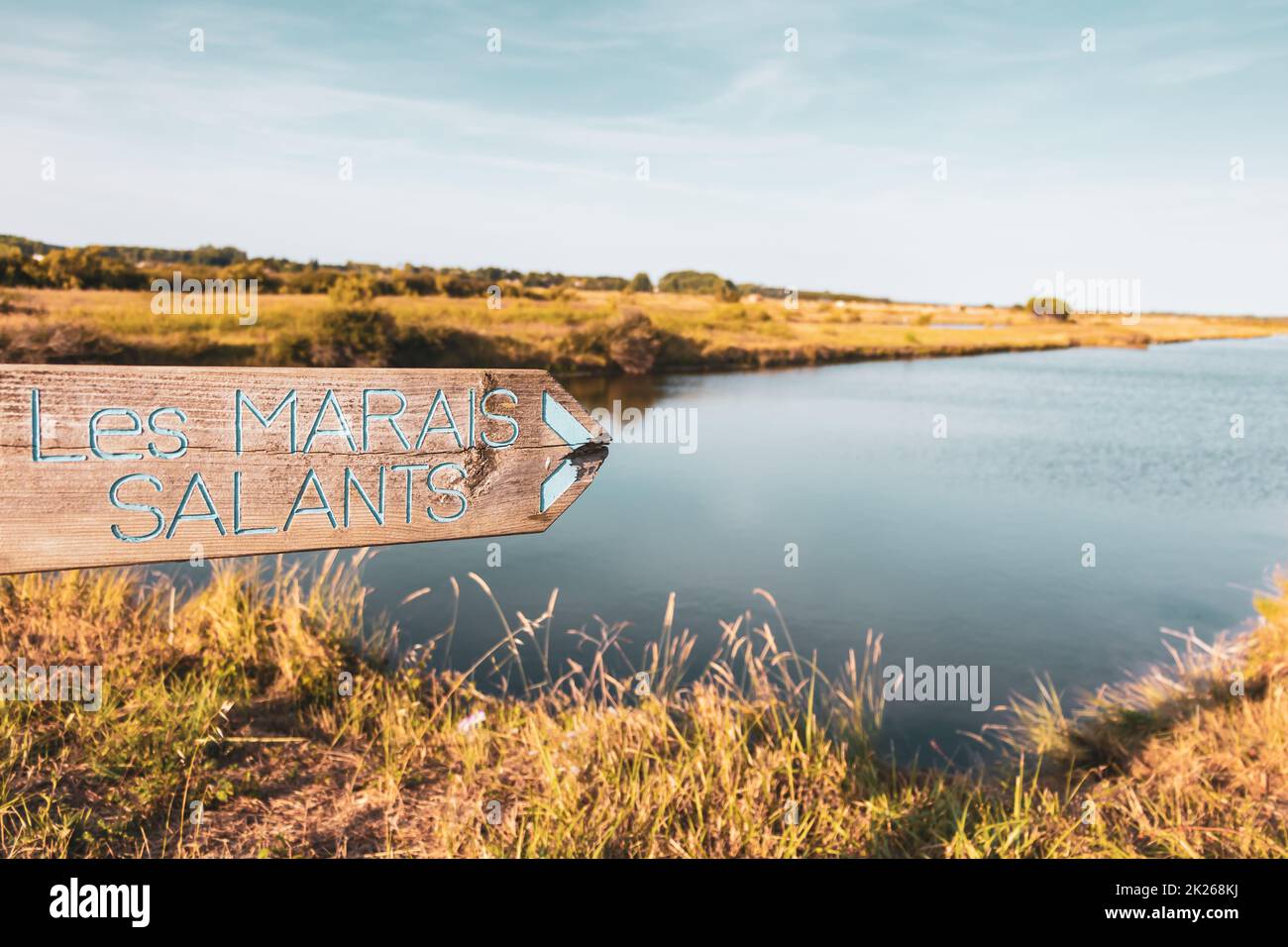 wooden sign indicating the direction of the salt marshes Stock Photo ...