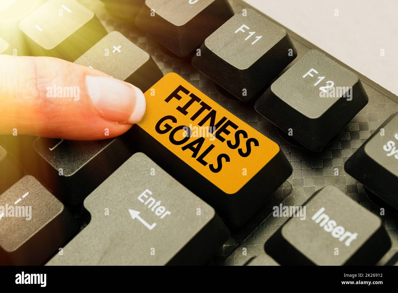 Hand writing sign Fitness Goals. Business overview Loose fat Build muscle Getting stronger ...