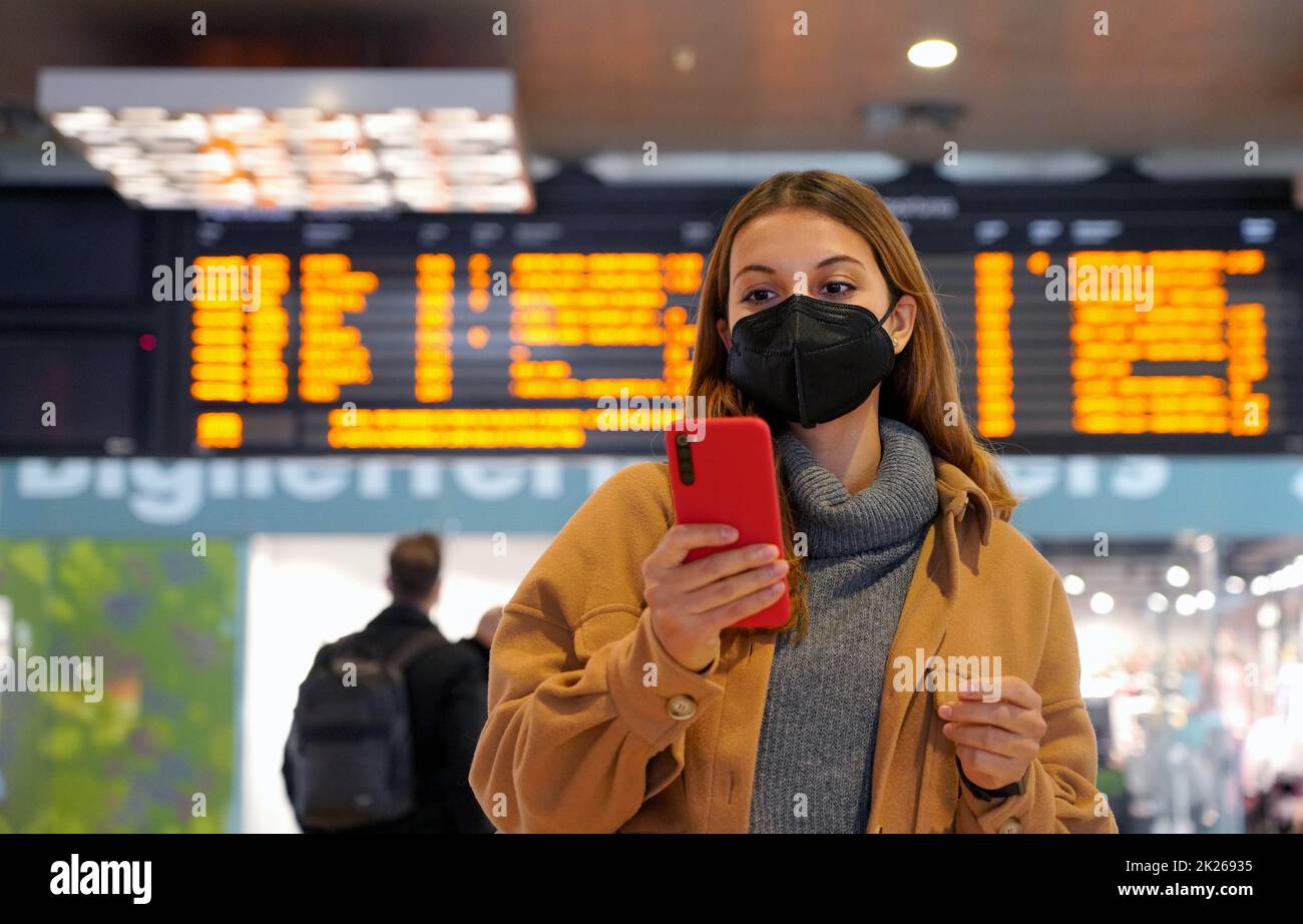 Traveler woman wearing KN95 FFP2 face mask at the subaway station ...