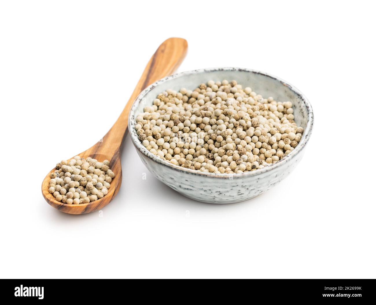 Whole pepper spice. White peppercorn grain in bowl Stock Photo - Alamy