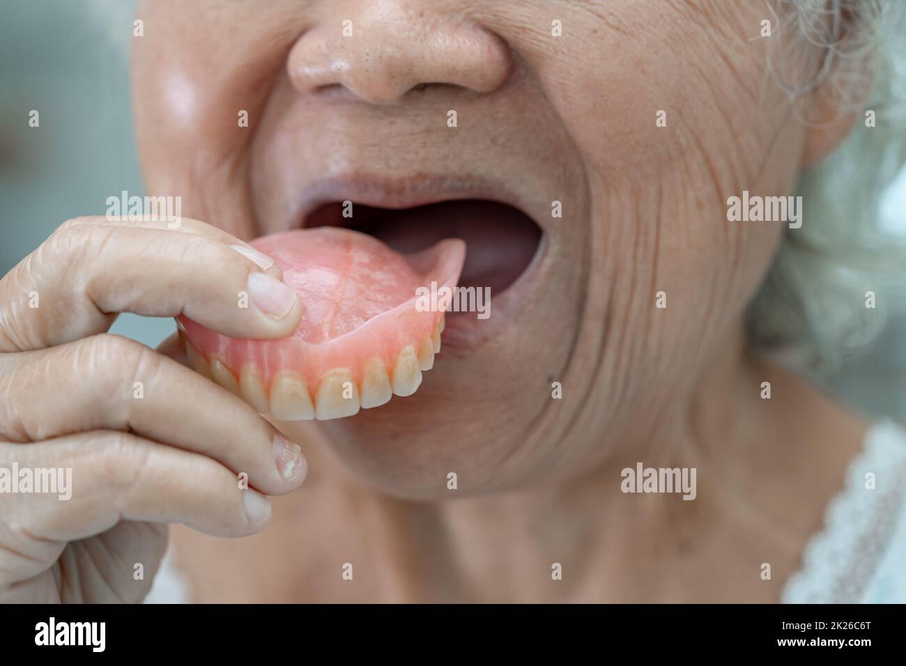 Elderly woman in swimming pool hi-res stock photography and images - Alamy