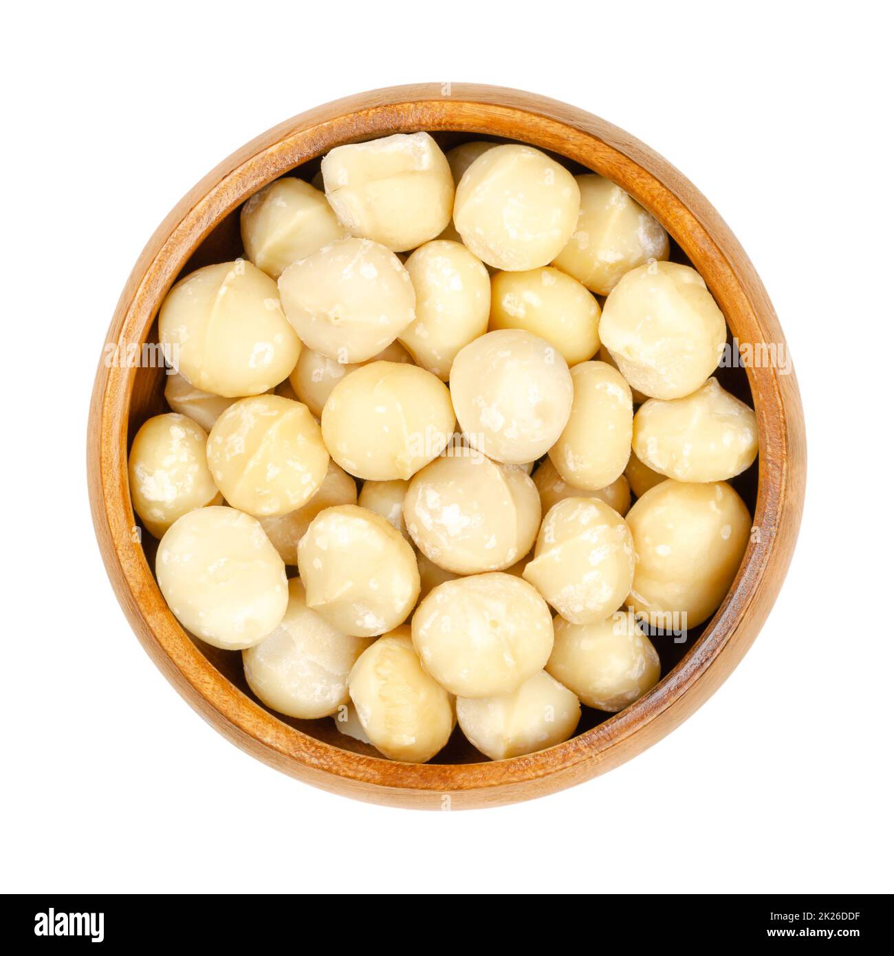 Shelled and dried macadamia nuts, in a wooden bowl Stock Photo - Alamy