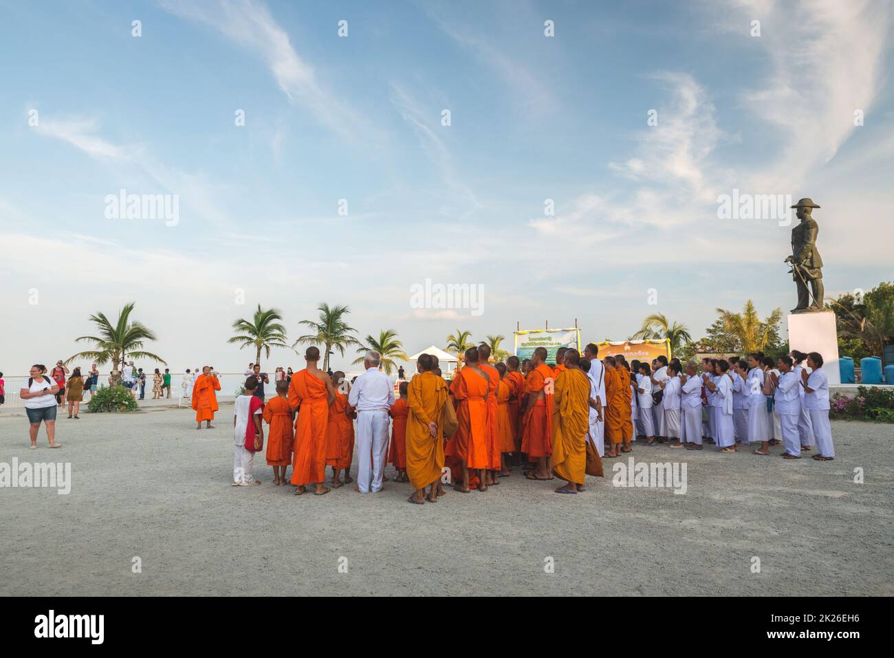 Young buddhists in orange clothes near the Big Buddha Temple in Phuket ...
