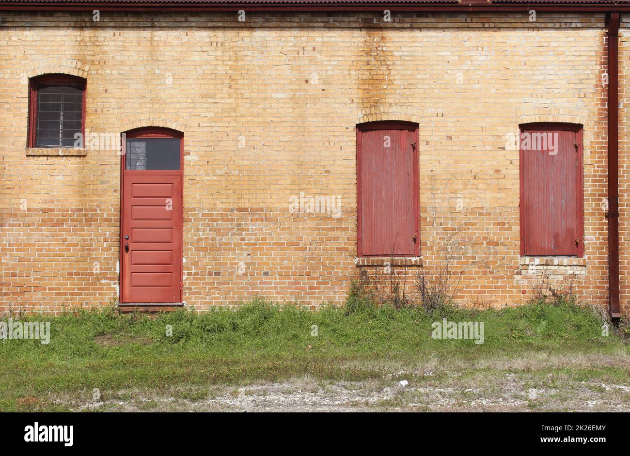 Close-up Building Detail Historical Brick Wall With Doors and Windows ...