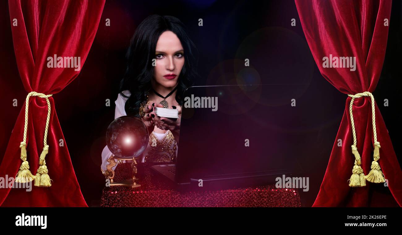 Psychic Tarot Card Reader on Laptop Computer With Crystal Ball Stock ...