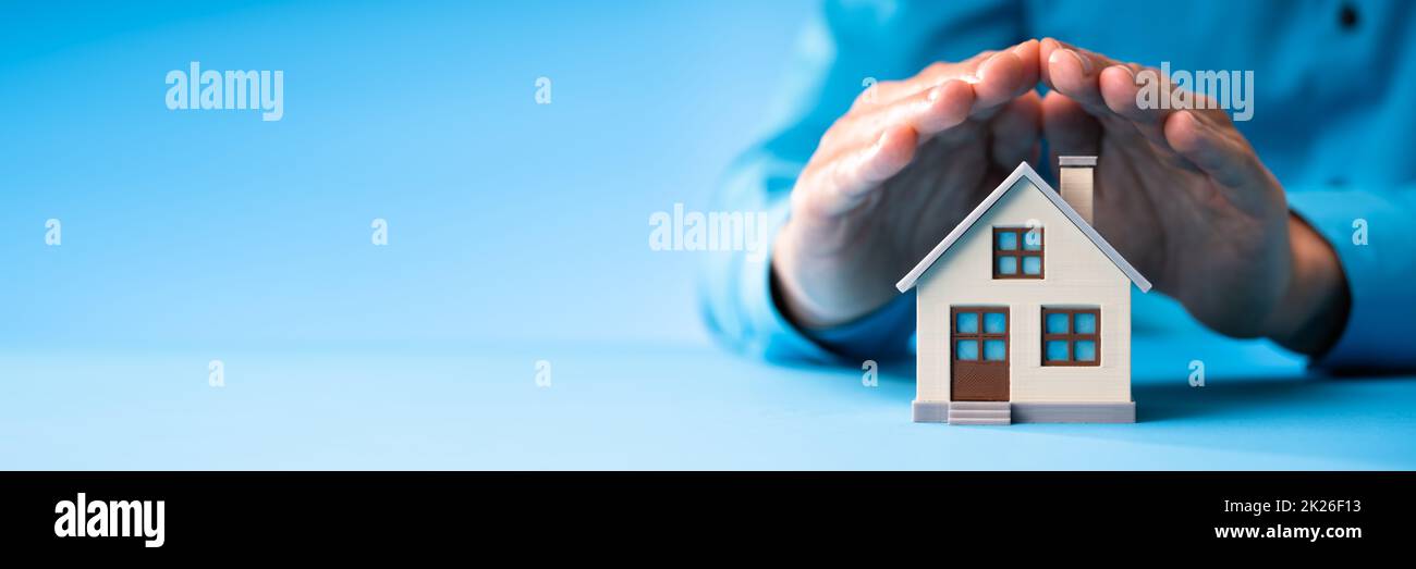 House Insurance Cover And Security Stock Photo - Alamy