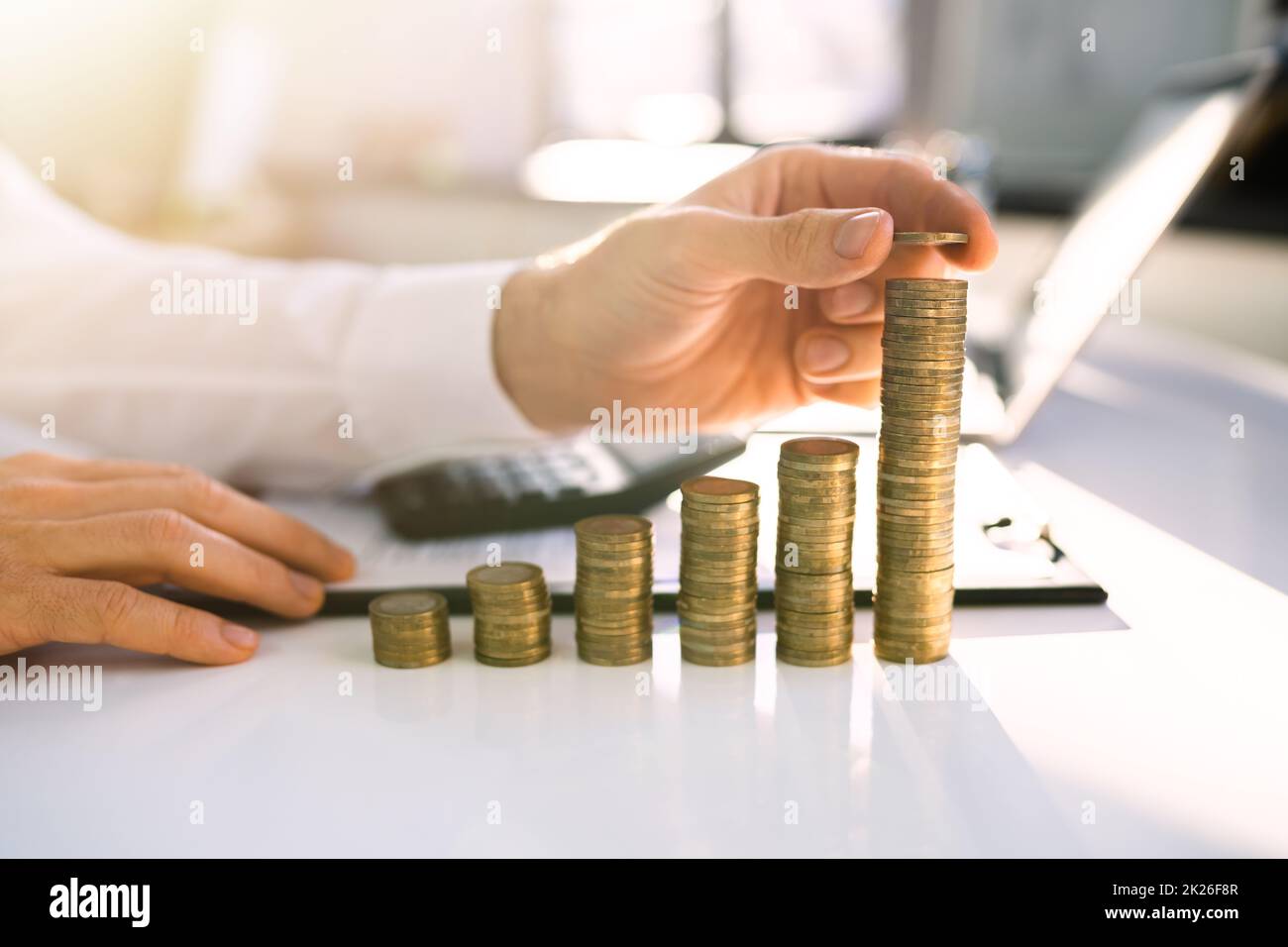 Accountant Calculating Tax Using Calculator On Desk Stock Photo - Alamy Accountant Calculating Tax Using Calculator On Desk Stock Photo - Alamy