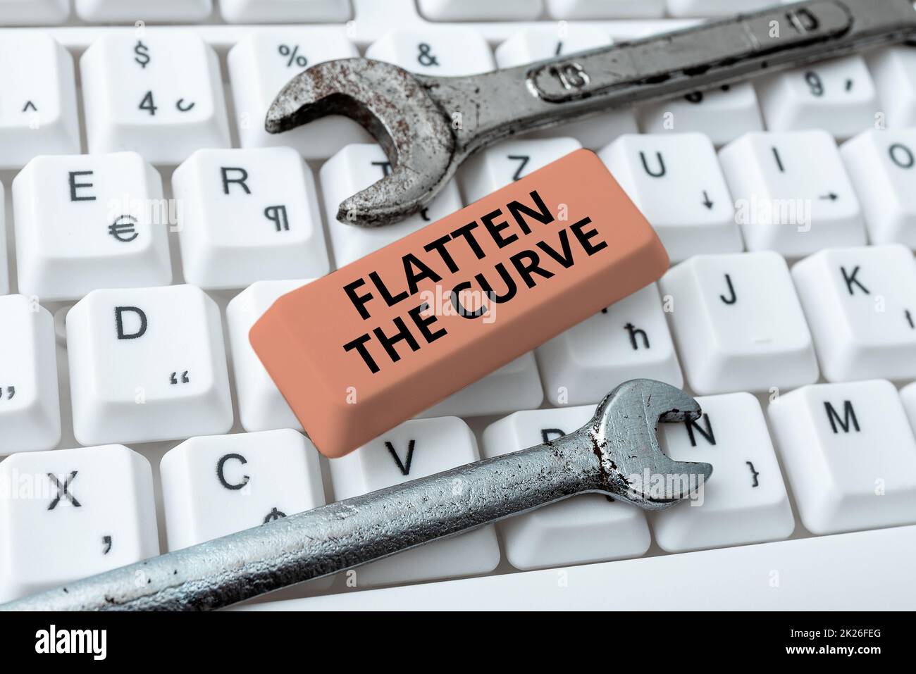 Text caption presenting Flatten The Curve. Word Written on raising an ...