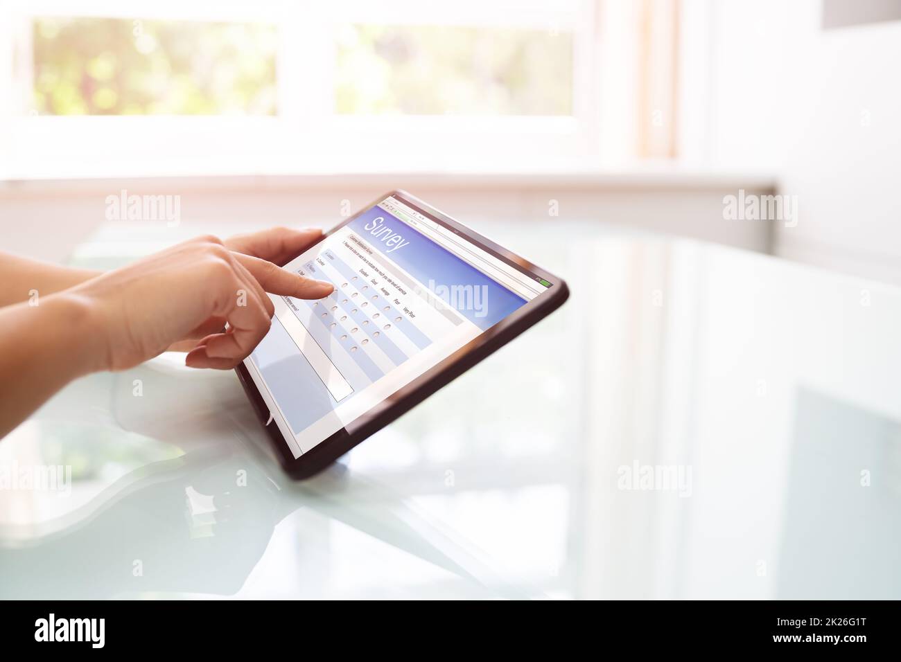 Filling Online Survey Form Or Questionnaire Poll Stock Photo - Alamy