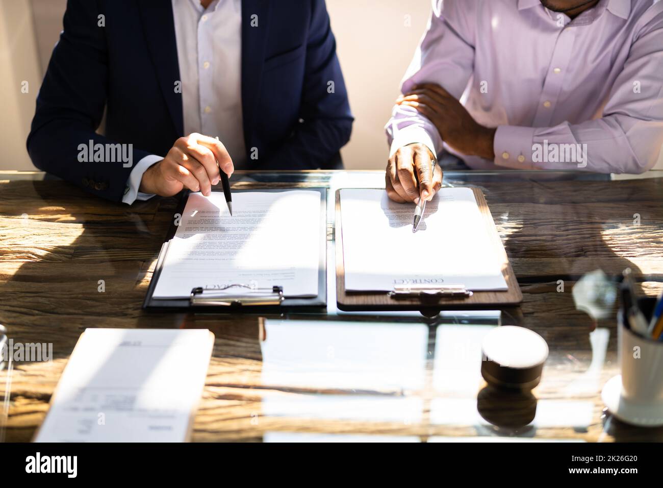 African american businessman reading document hi-res stock photography ...