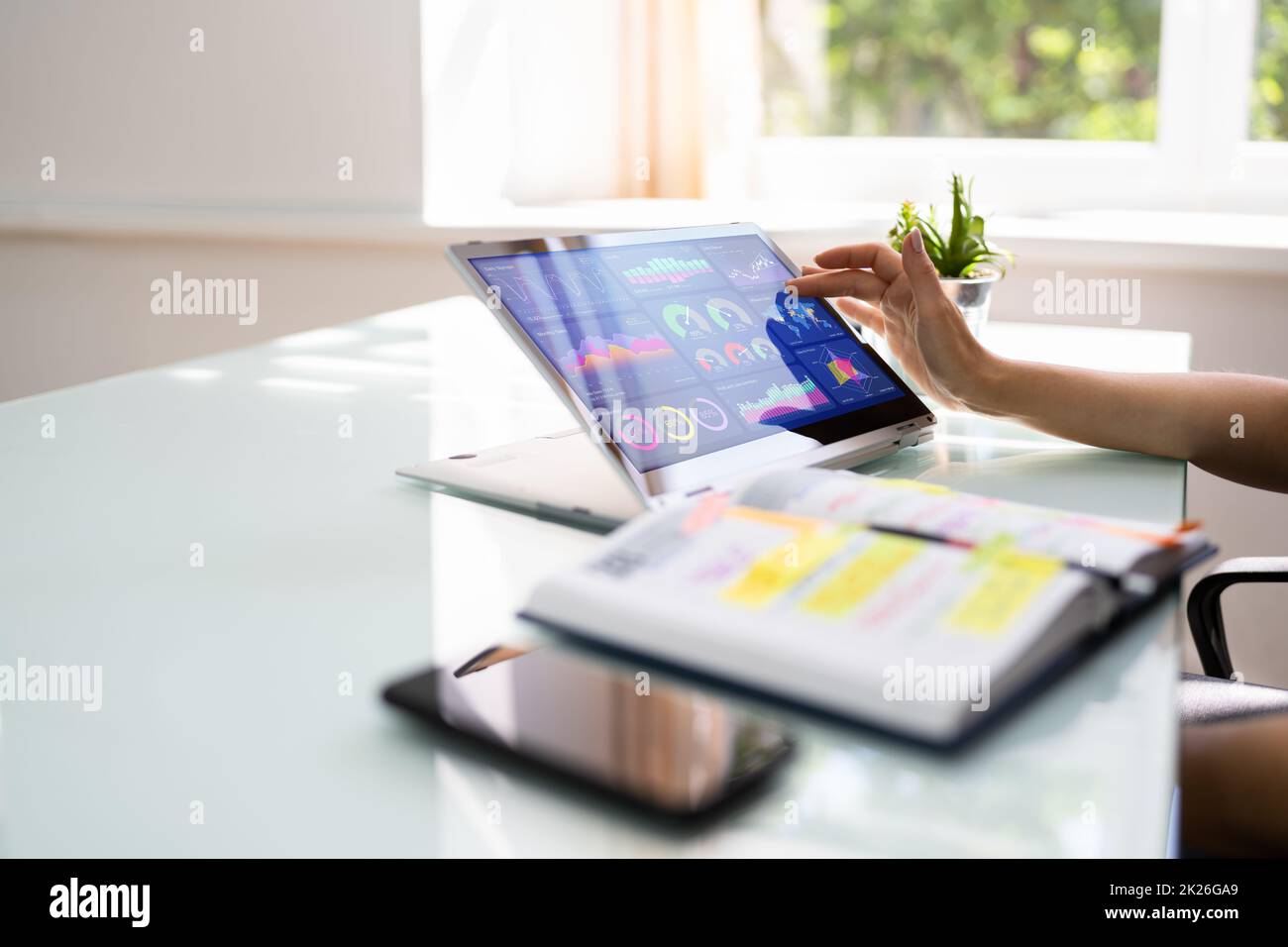 Data Analyst Using Data Analytics Stock Photo - Alamy