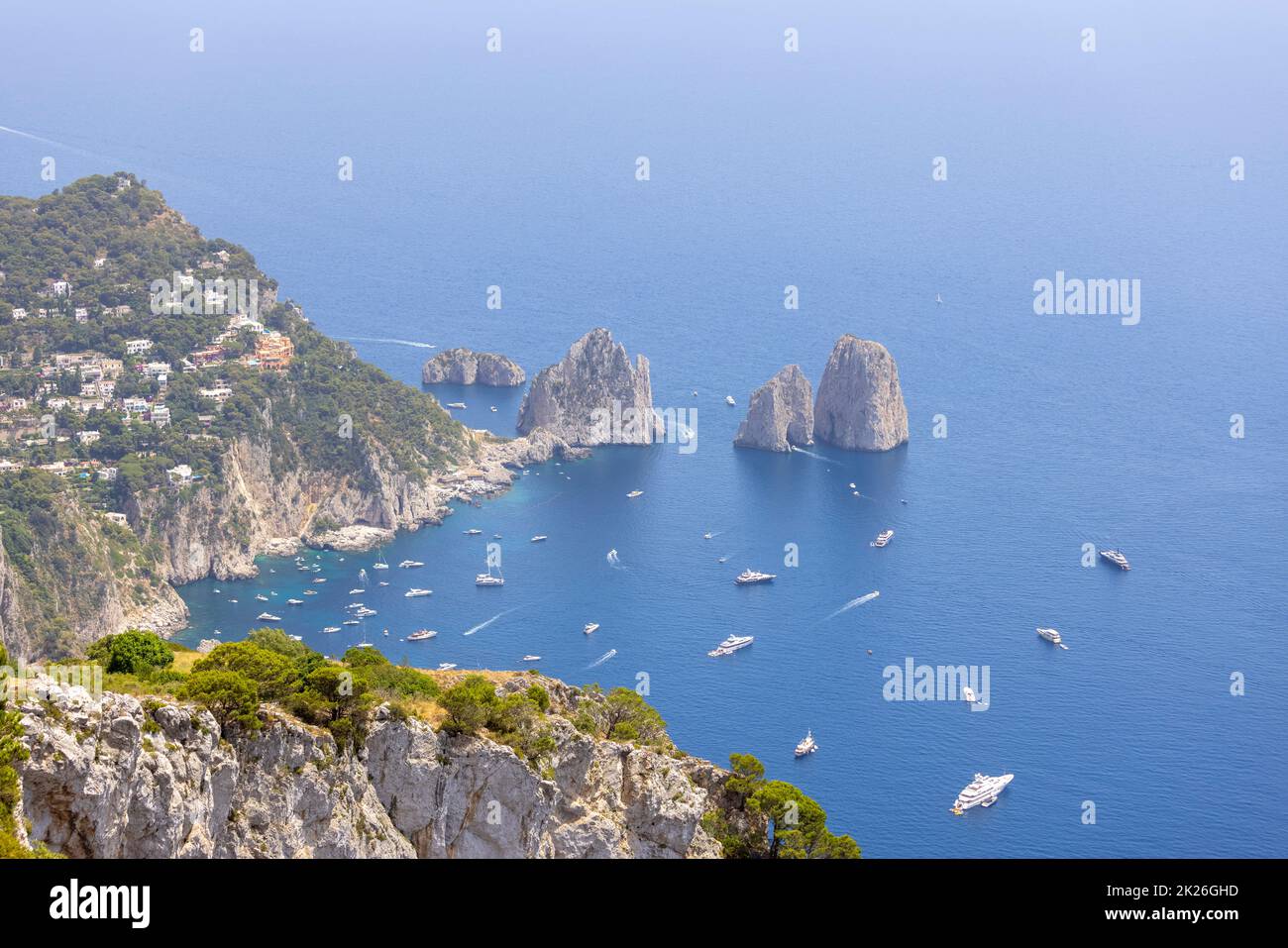 Faraglioni, attractive coastal rock formation eroded by waves, Capri ...
