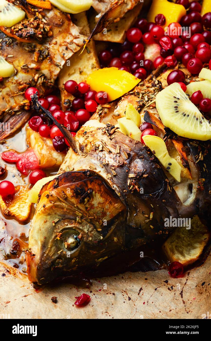 Tasty crucian fried with kiwi and mango Stock Photo - Alamy