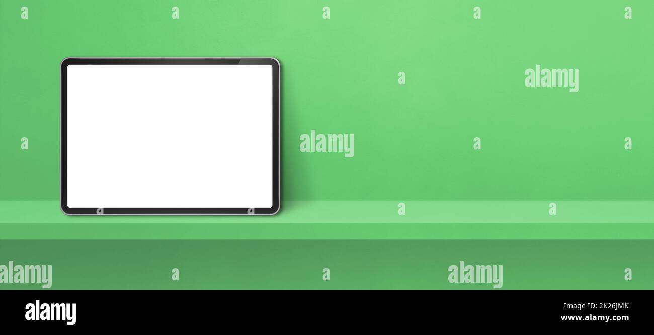 Digital tablet pc on green wall shelf. Background banner Stock Photo ...