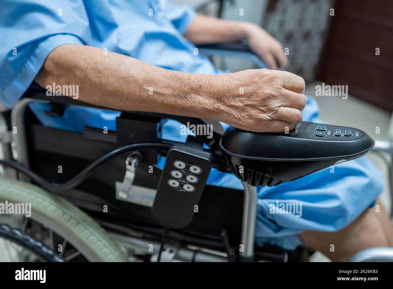 Asian senior or elderly old lady woman patient on electric wheelchair ...