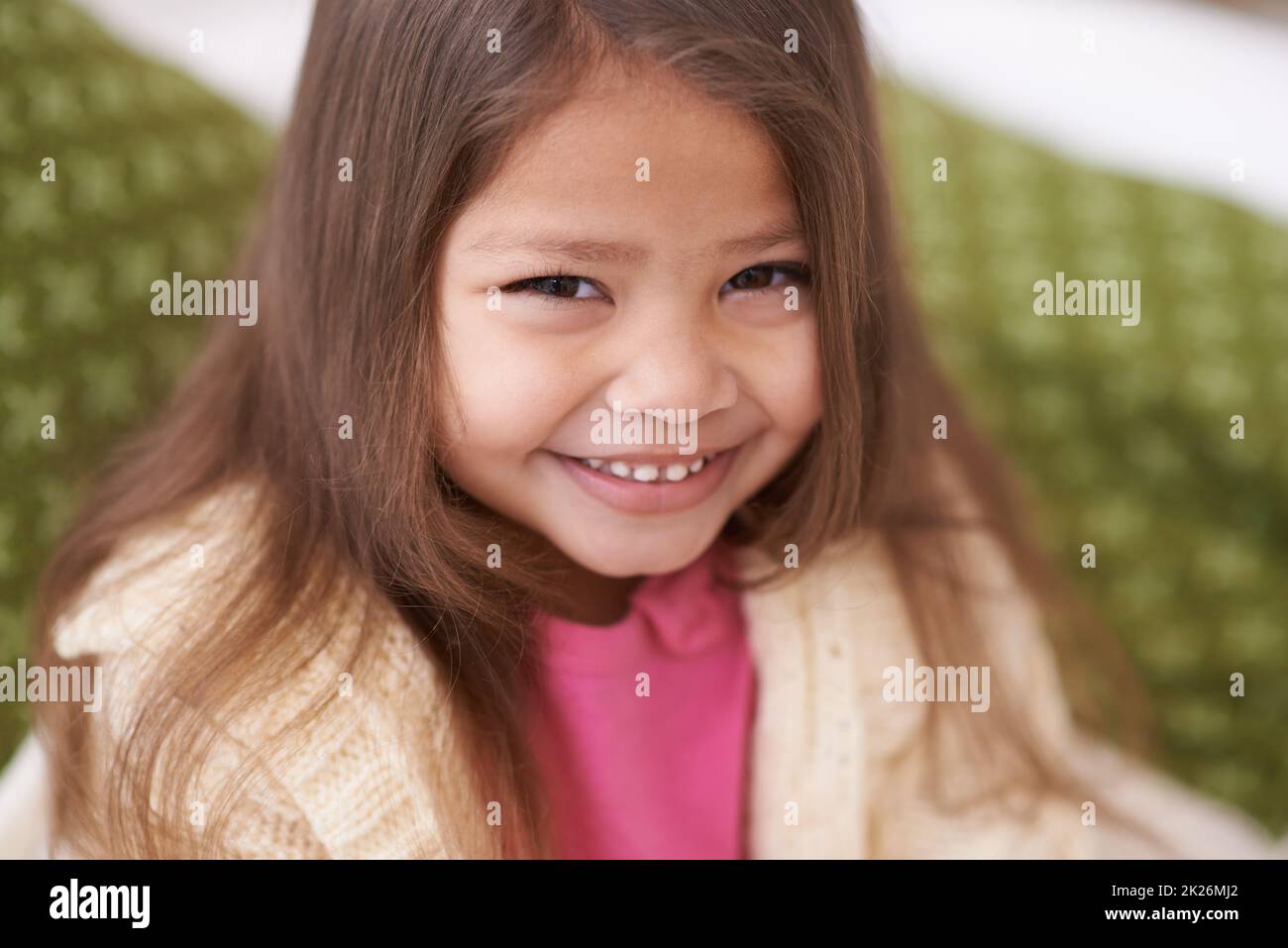 Cute as a button. Closeup portrait of a happy little girl at home Stock ...